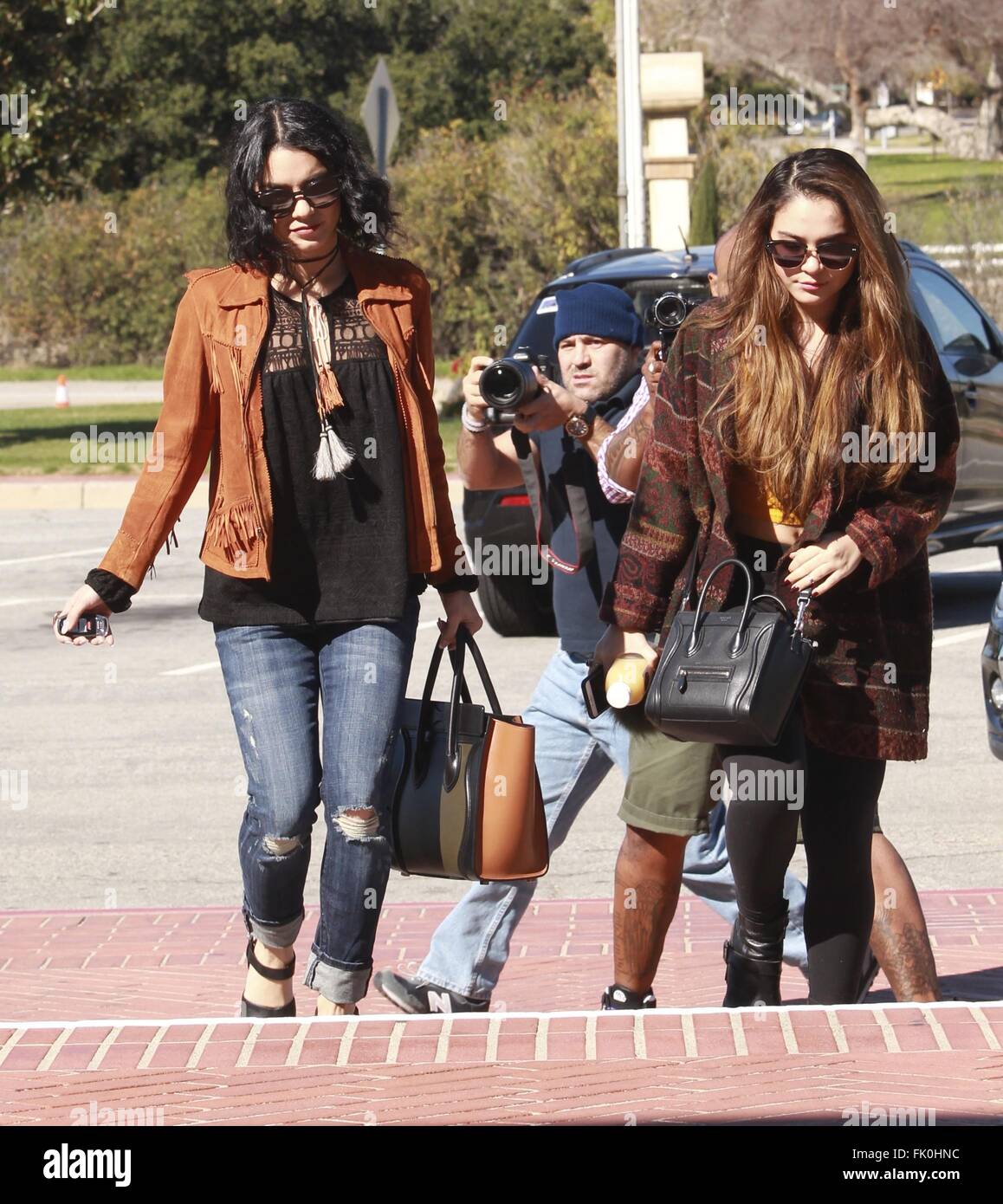 Vanessa Hudgens and her sister Stella arrive at Forest Lawn Memorial ...