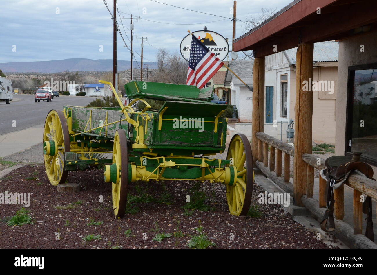 green and yellow painted wagon in arizona with american flag Stock ...