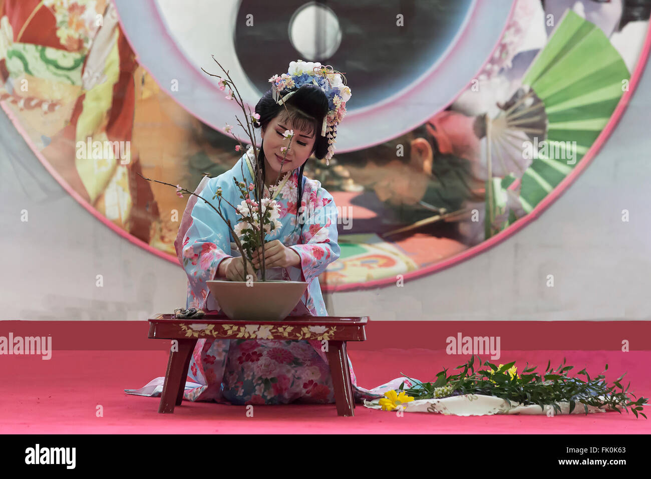 Geisha perforMS an ikebana ceremony at the Oriental festival in Turin ...