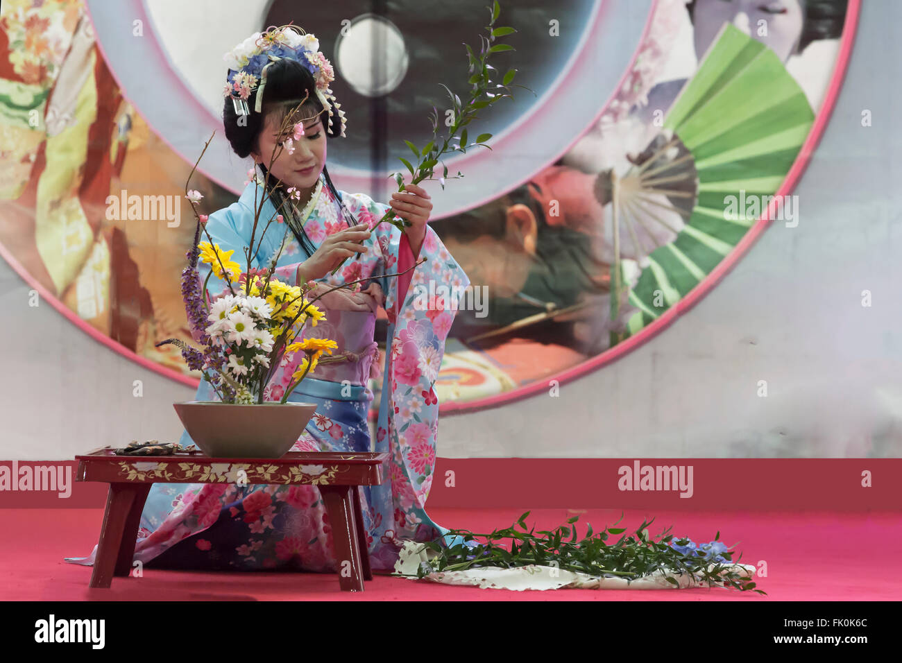 Geisha performs an ikebana ceremony at the Oriental festival in Turin ...