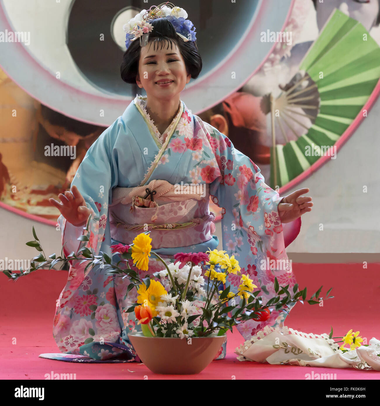 Geisha performs an ikebana ceremony at the Oriental festival in Turin ...