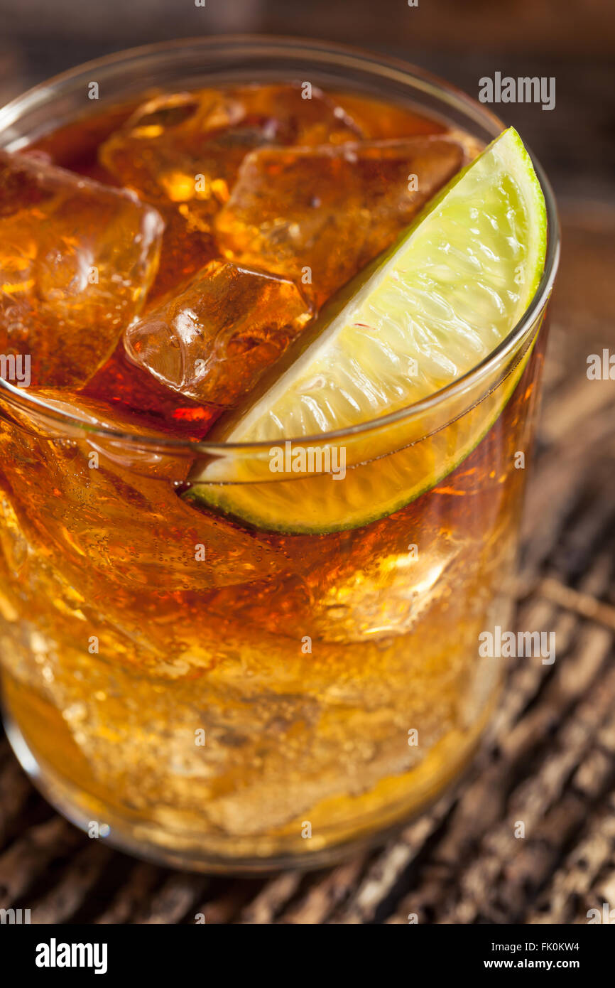 Dark and Stormy Rum Cocktail with Lime and Ginger Beer Stock Photo - Alamy