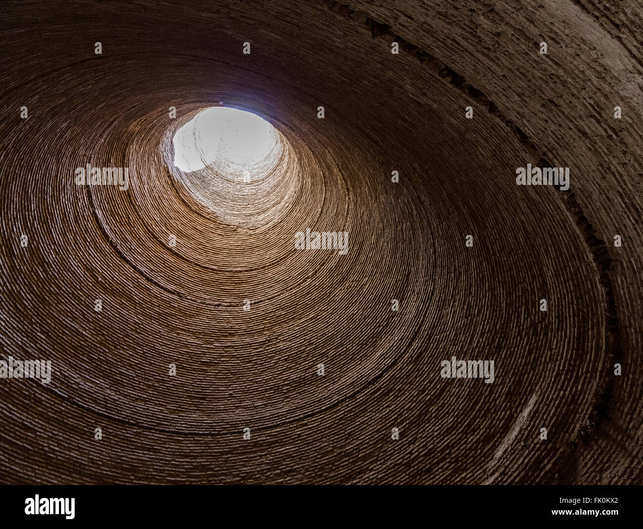 Interior of conical mud brick ice house, or yakchal, at Abarku, Iran ...