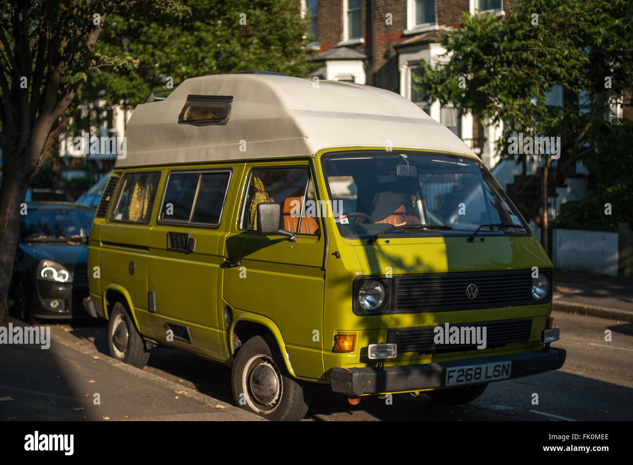 Old Volkswagen camper van, retro green, East London Stock Photo - Alamy