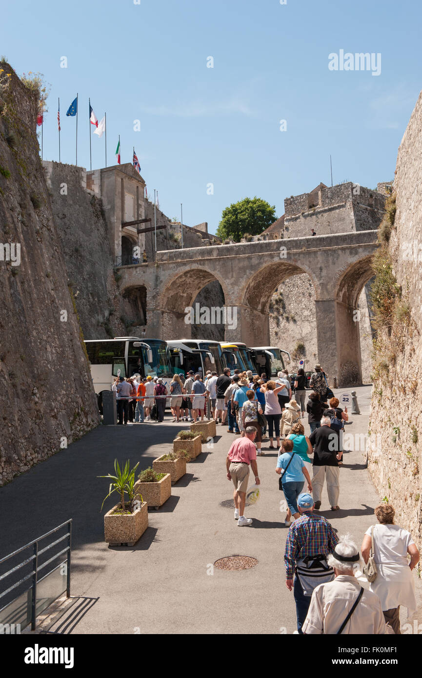 Tourists walking to coaches for a tour in Villefranche, Nice Stock ...
