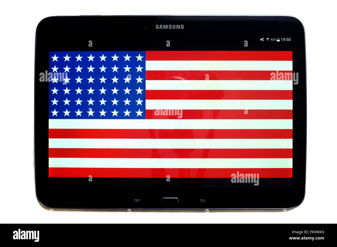 The flag of America displayed on the screen of a tablet photographed ...