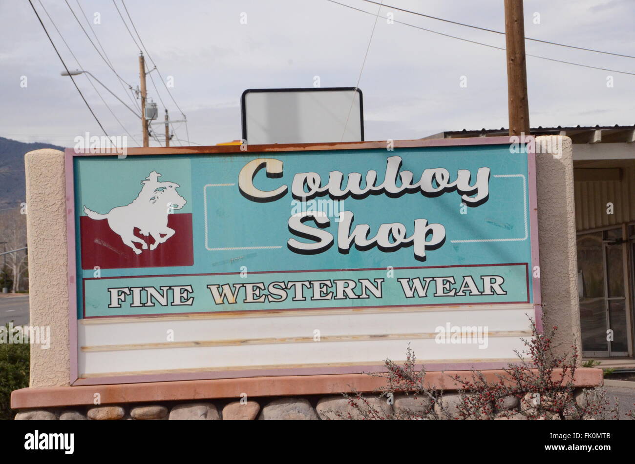cowboy shop sign arizona blue fine western wear with cowboy on horse ...