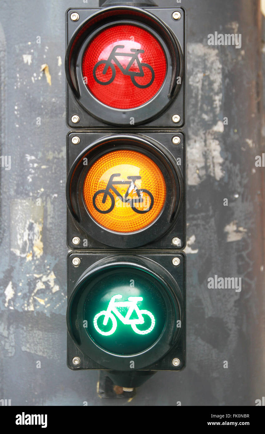All three lights as a traffic sign in the city. Red orange green ...