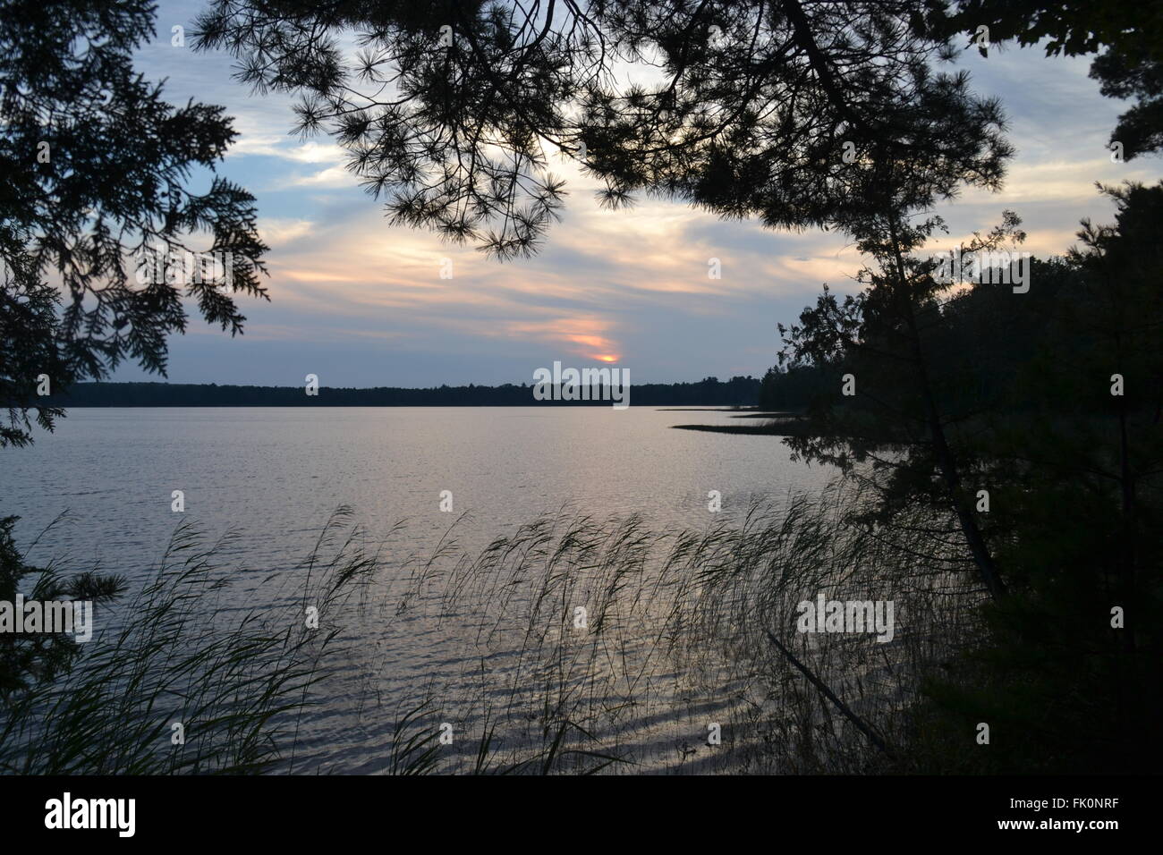 A sunset on Steuben Lake in the Upper Peninsula of Michigan Stock Photo ...