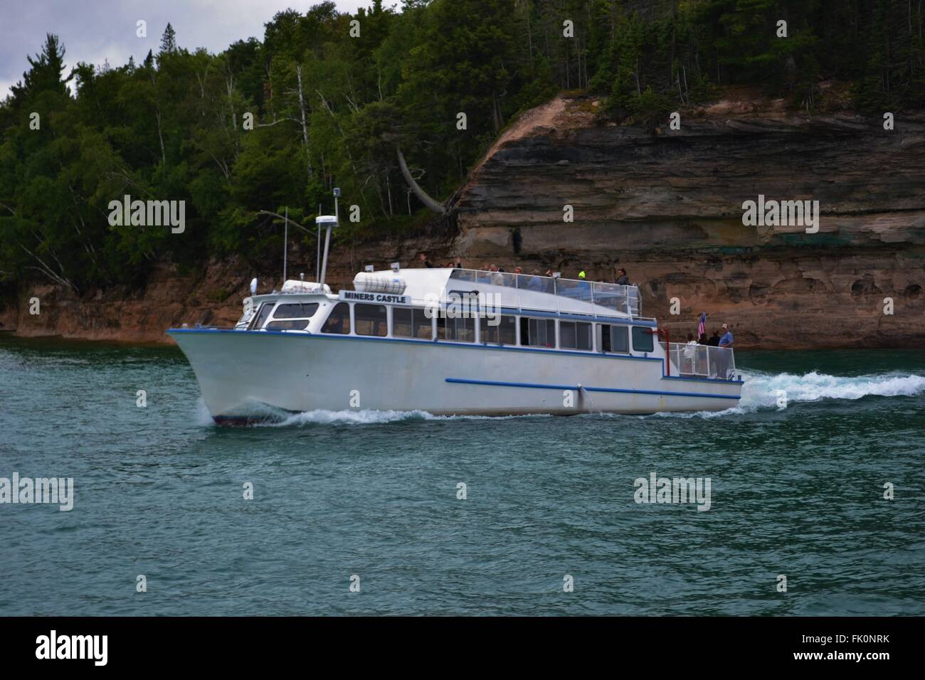 A boat cruises in Lake Superior Stock Photo - Alamy