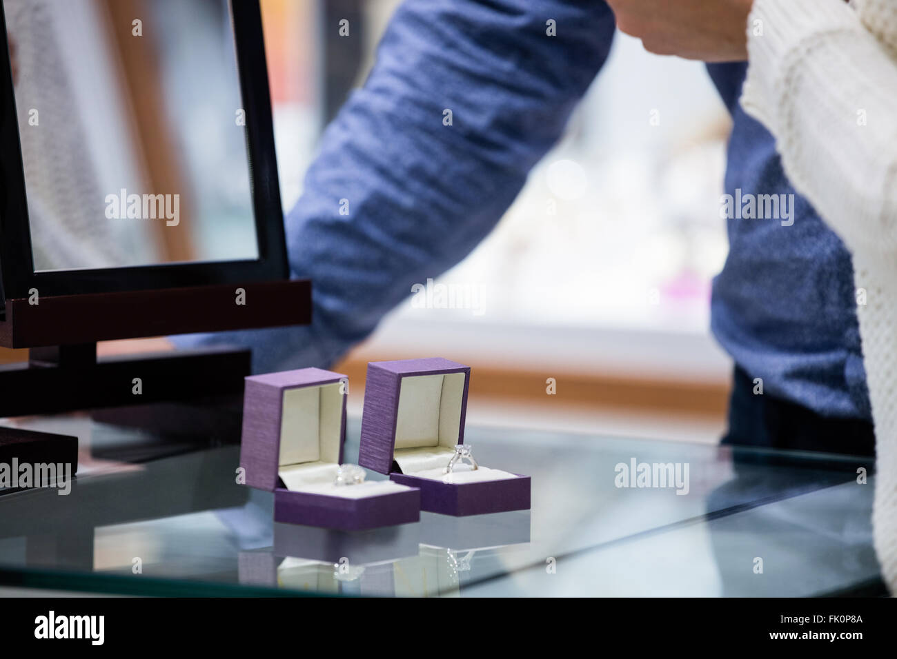 Two finger ring boxes on a counter Stock Photo - Alamy