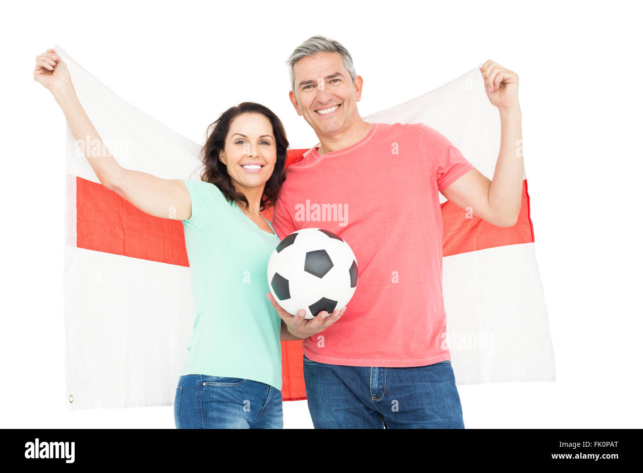 Excited football fan couple cheering at camera Stock Photo - Alamy