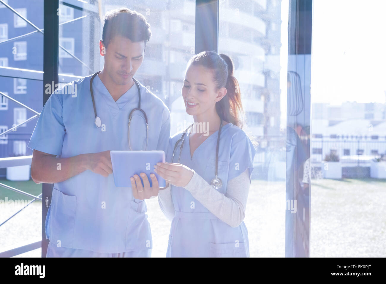 Medical team interacting using digital Stock Photo - Alamy