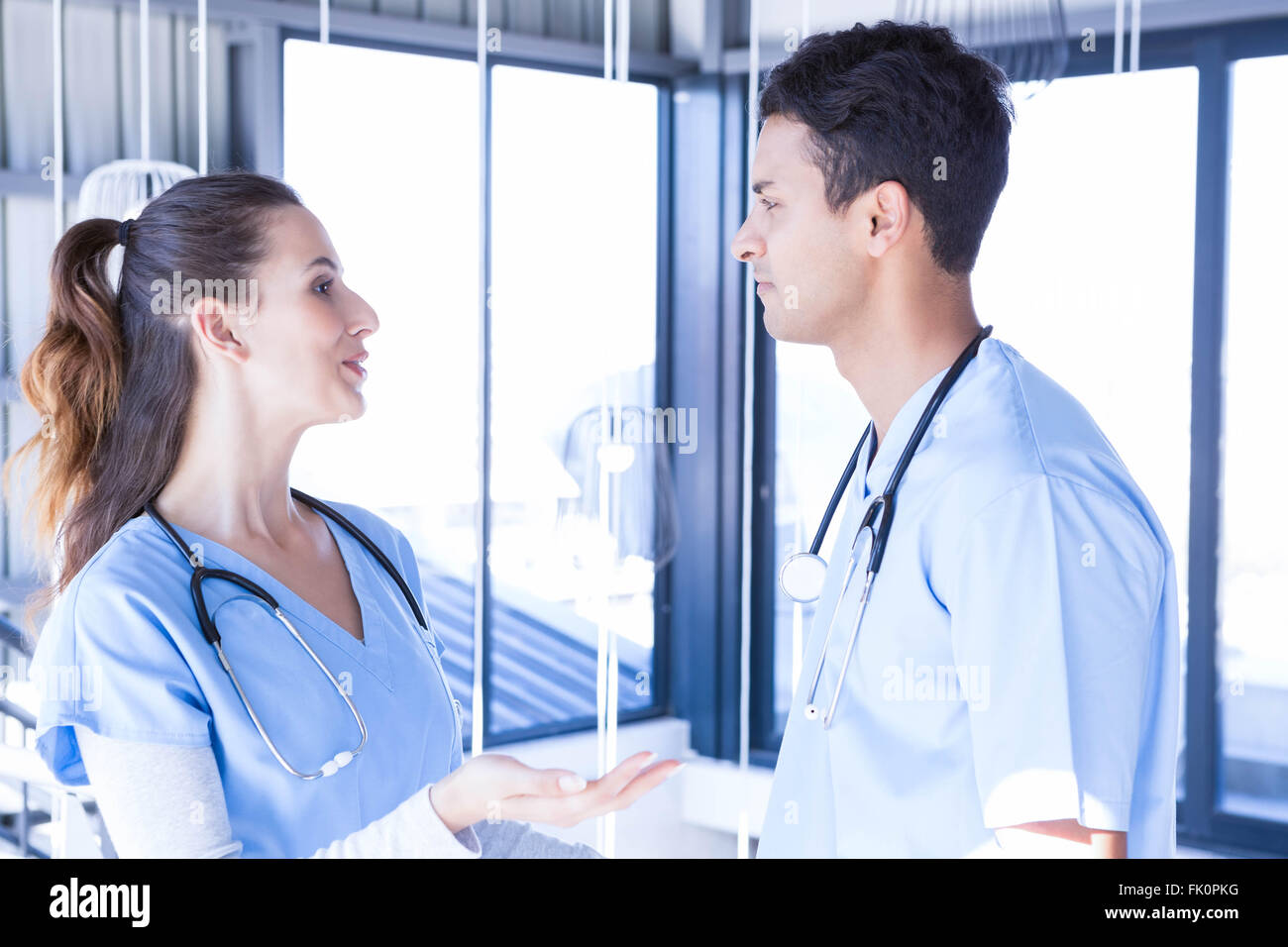 Doctors talking each other hi-res stock photography and images - Alamy