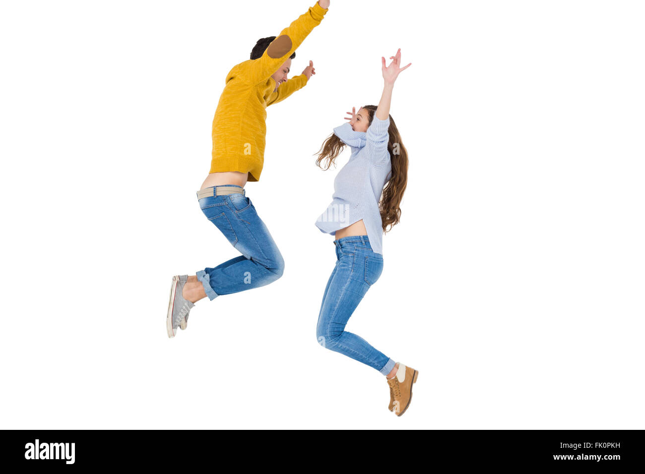Stylish man woman jumping hi-res stock photography and images - Alamy