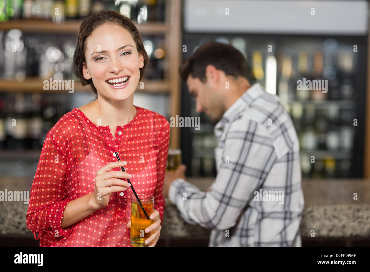 Woman smiling at the camera Stock Photo - Alamy