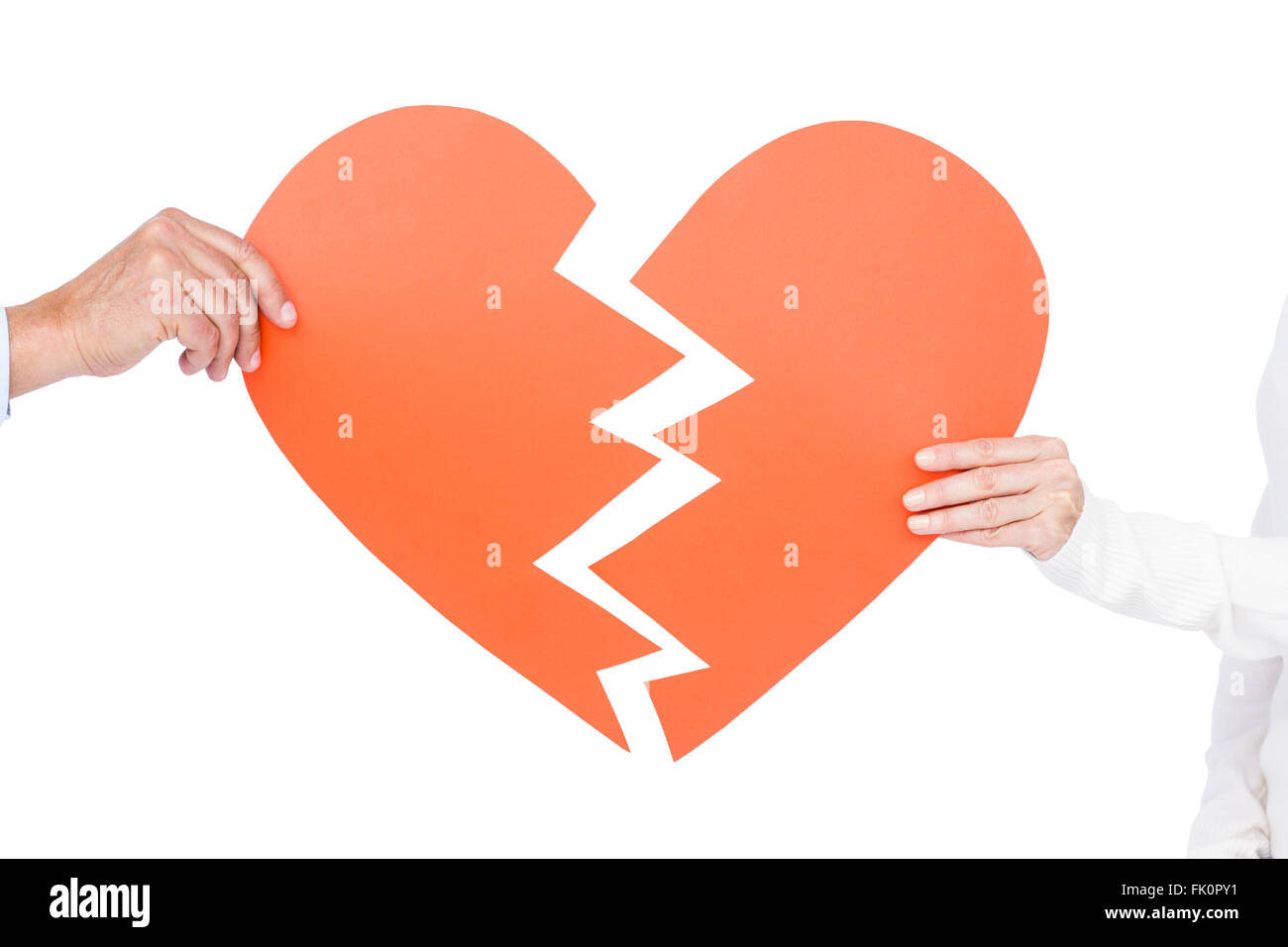Couple holding broken heart Stock Photo - Alamy