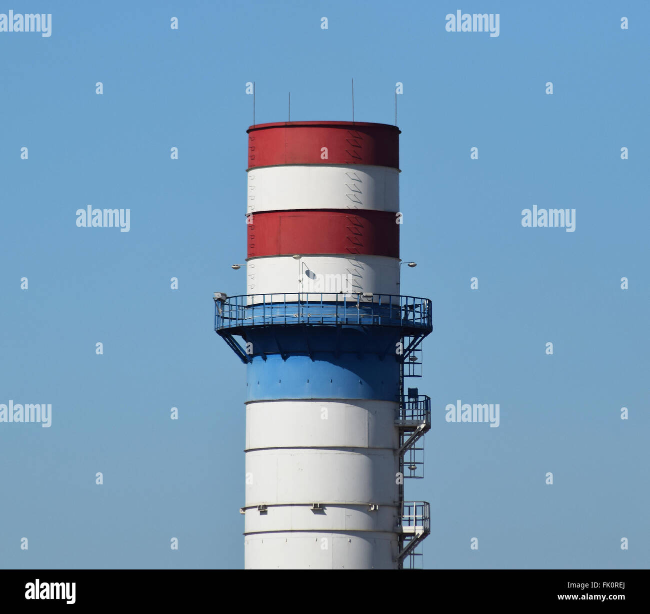 Wide chimney at the plant for the processing of scrap metal. Huge ...