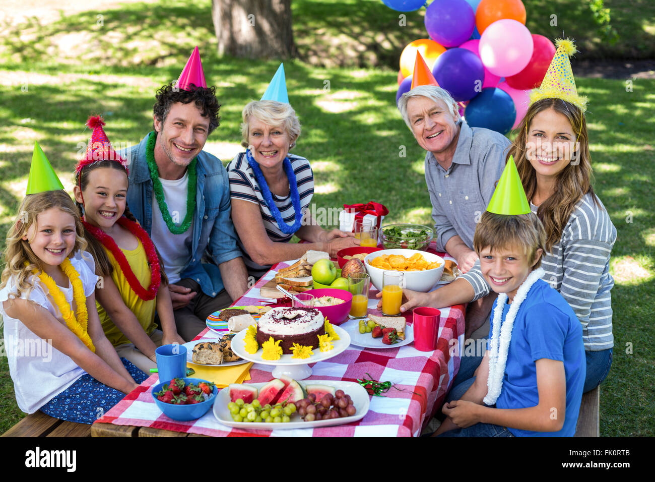 Happy family celebrating a birthday Stock Photo - Alamy