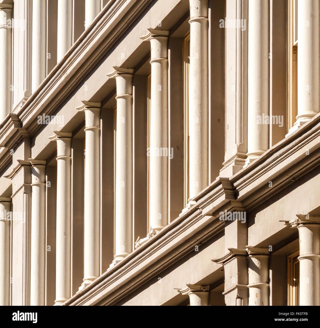 A row of pillars in the facade of a house Stock Photo - Alamy