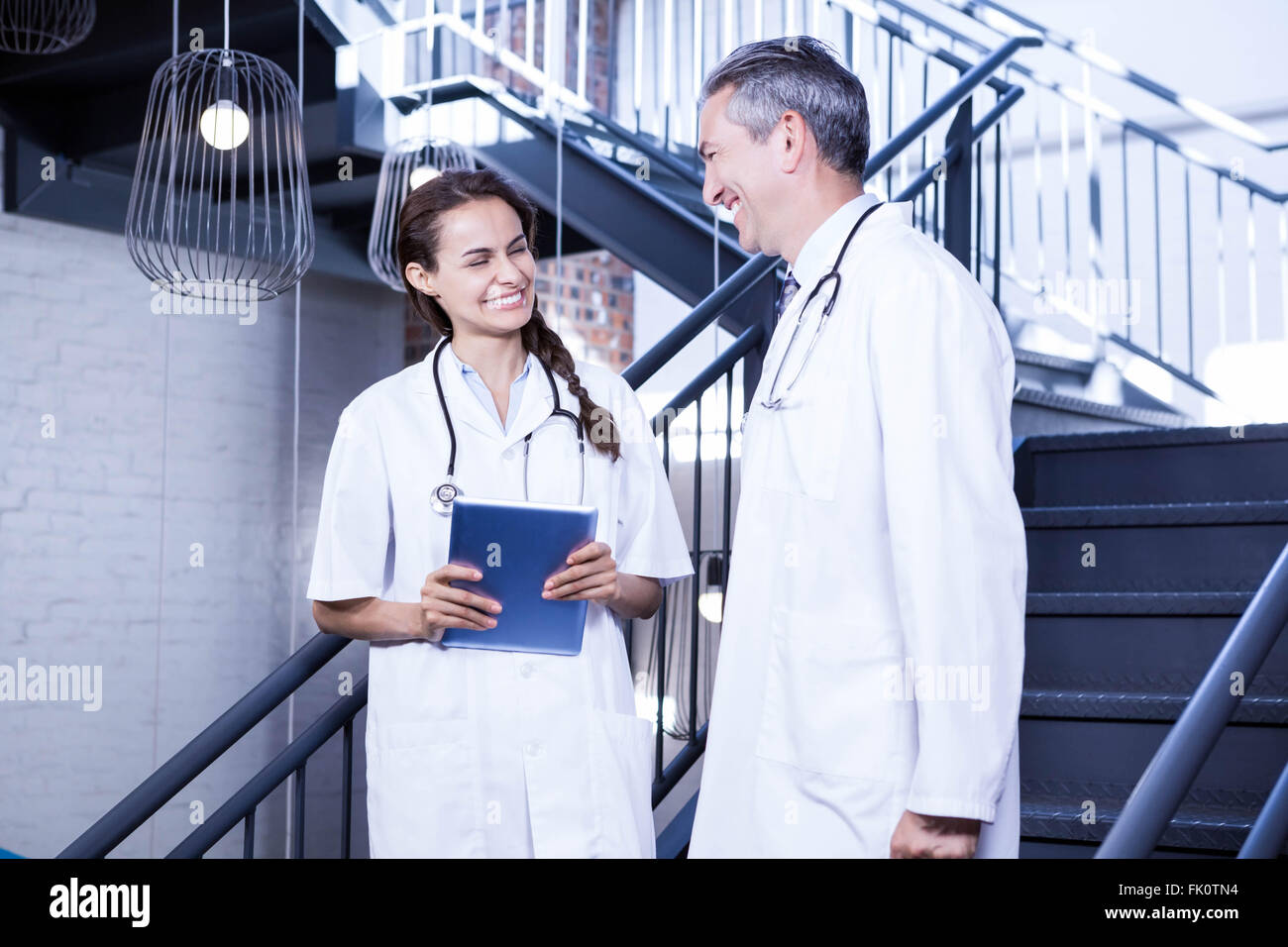 Medical professional interacting tablet computer hi-res stock photography and images - Alamy