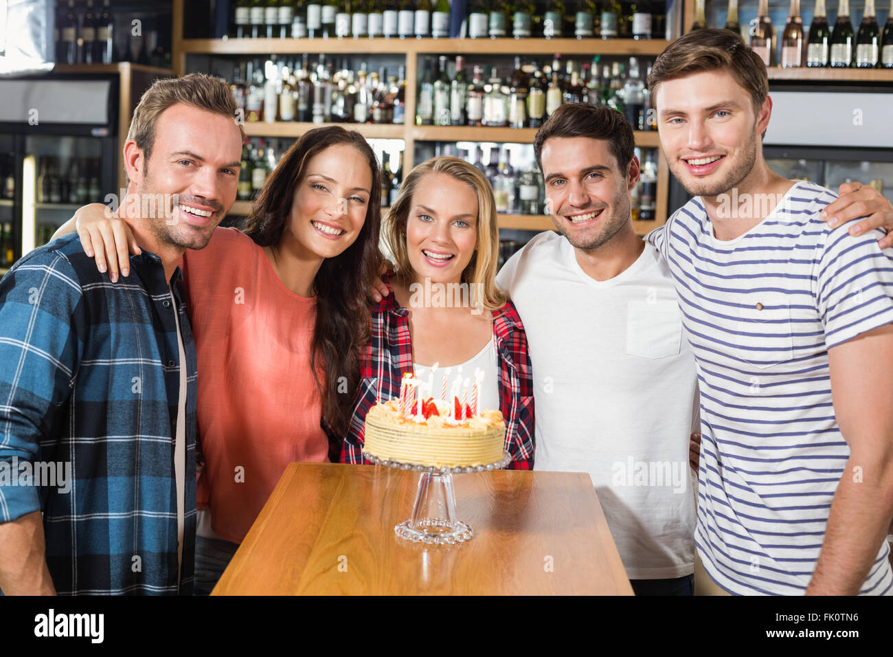 Friends celebrating birthday Stock Photo - Alamy