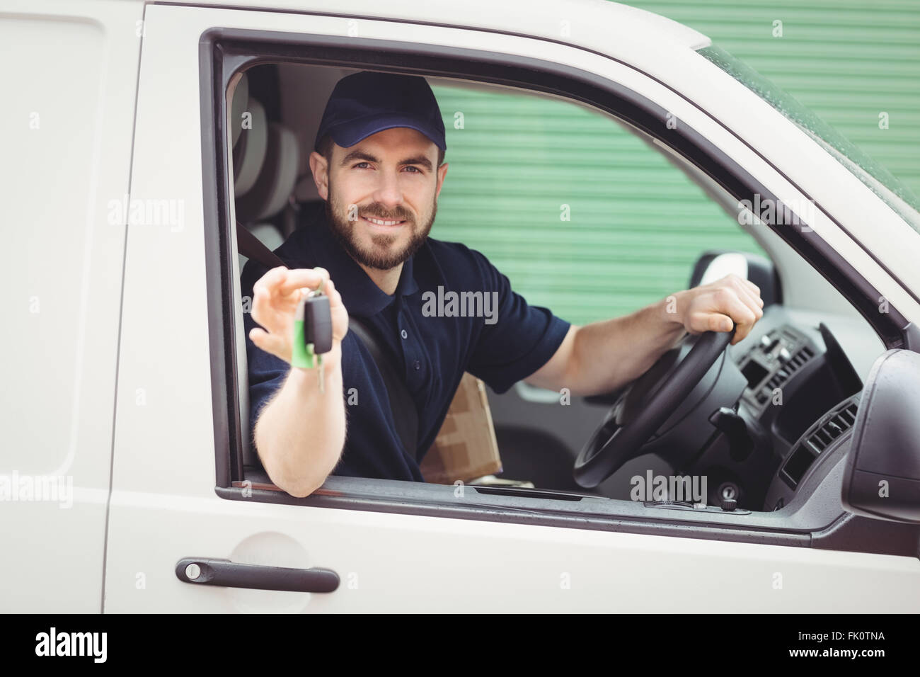 Male courier sitting in hi-res stock photography and images - Alamy
