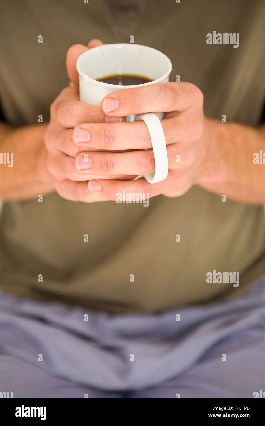 Hands holding mug hi-res stock photography and images - Alamy
