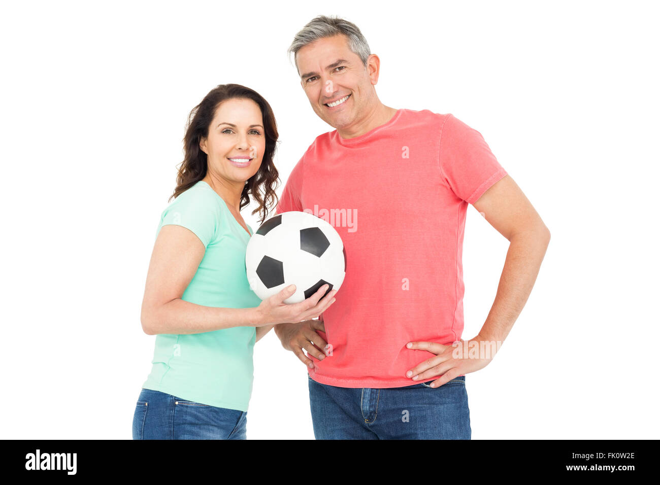 Excited football fan couple cheering at camera Stock Photo - Alamy