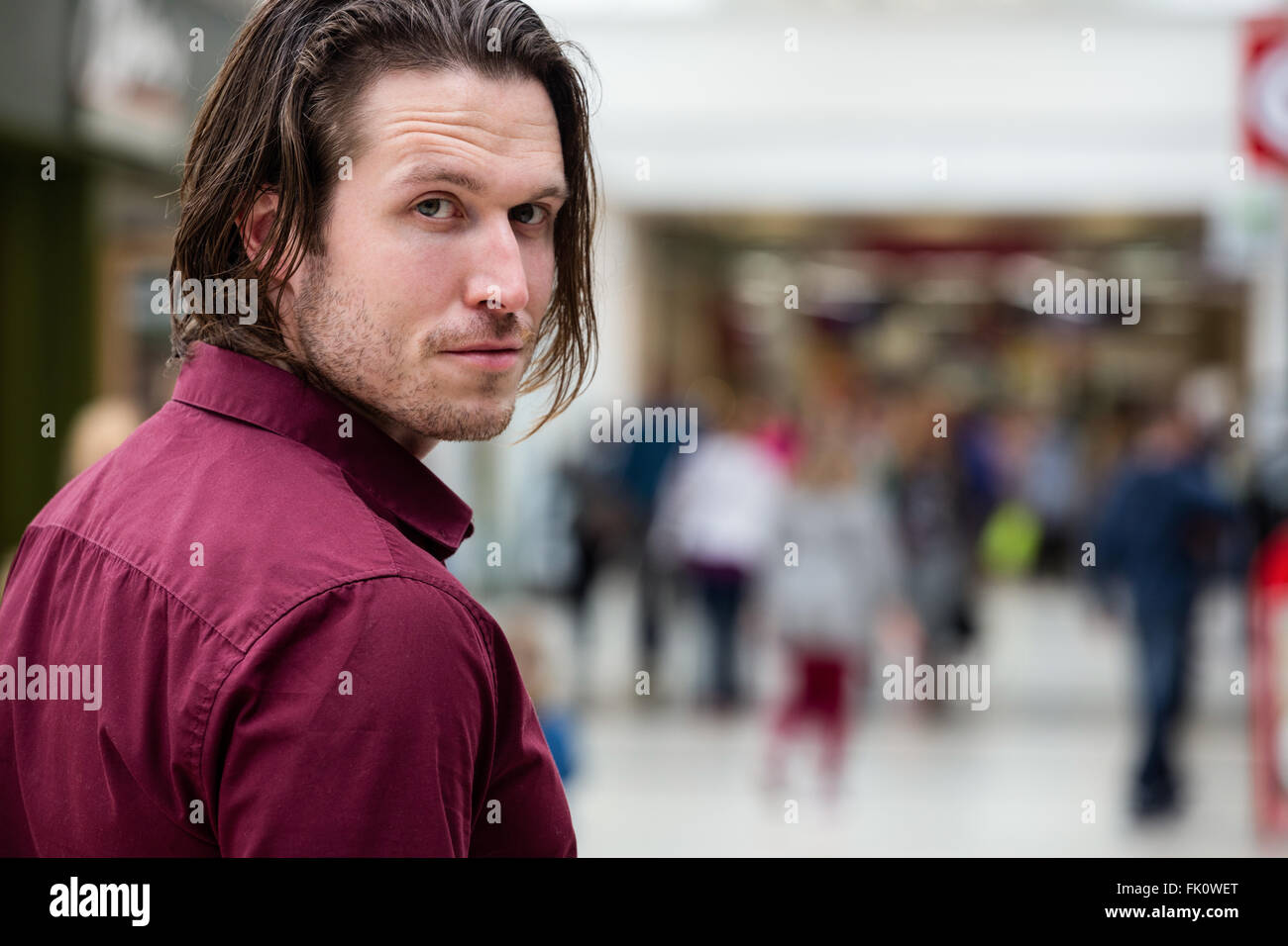 Man outside the shop Stock Photo - Alamy