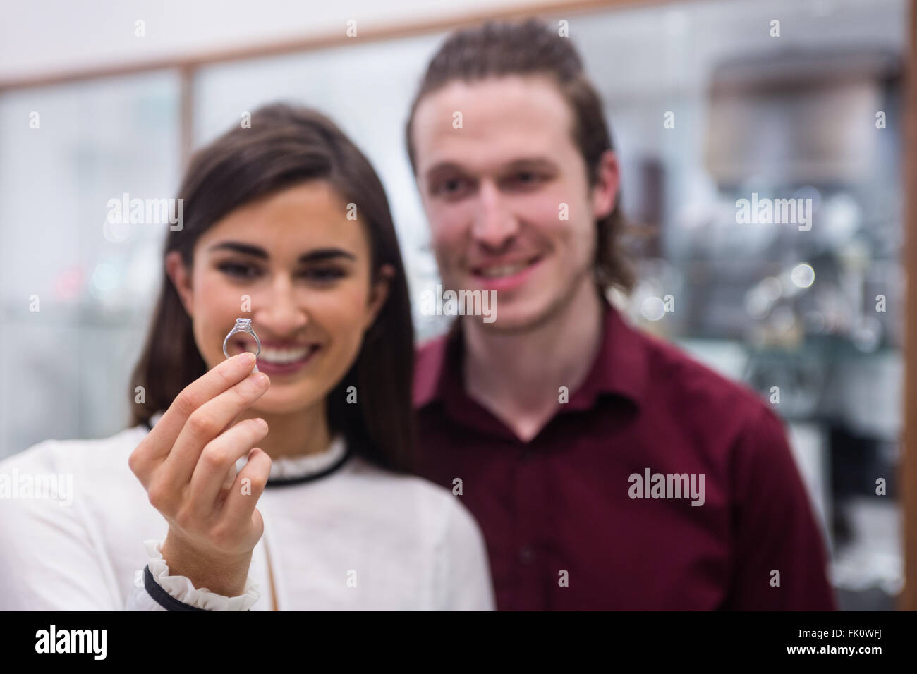 Jeweler looking at ring hi-res stock photography and images - Alamy