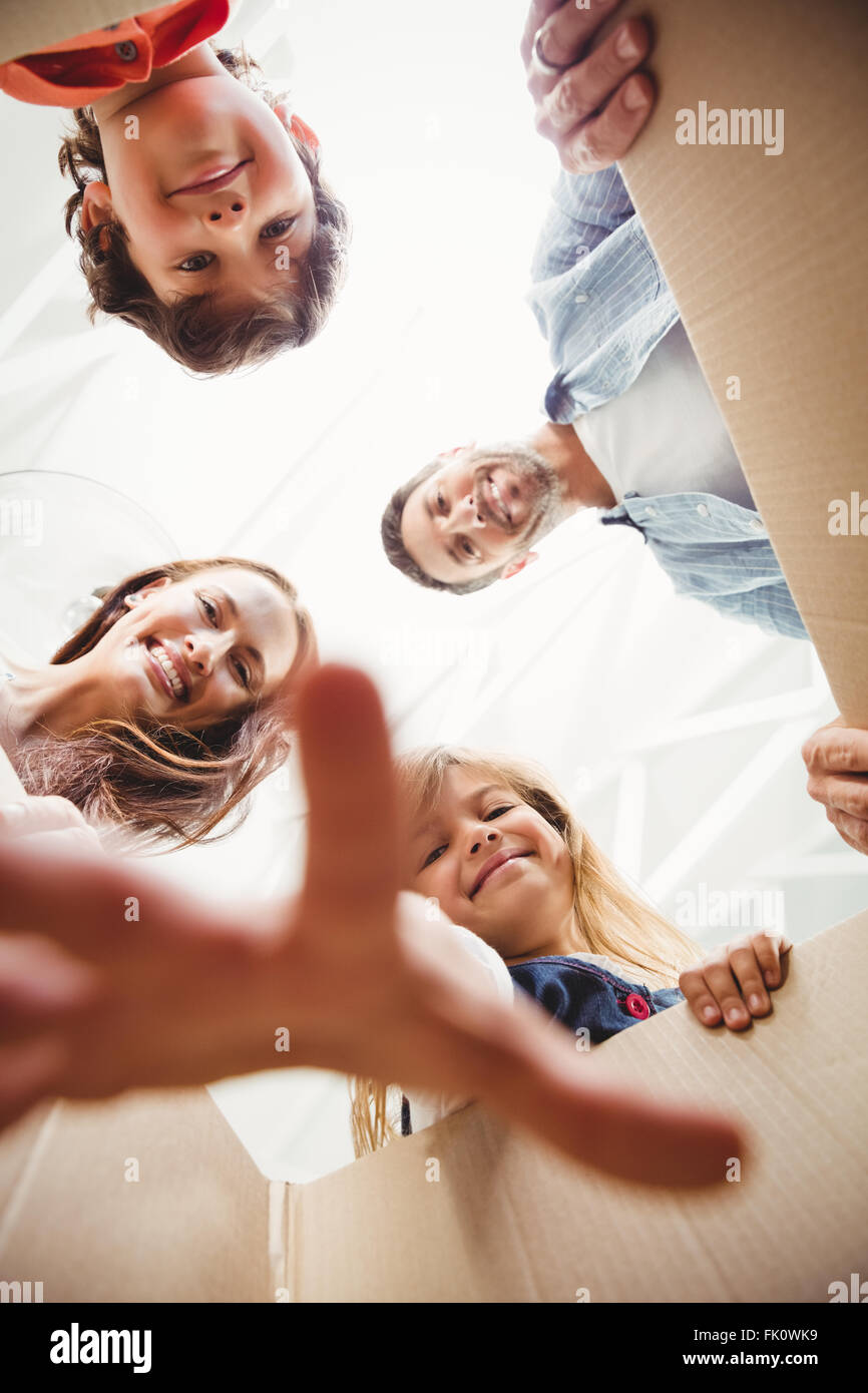 Happy family with cardboard boxes Stock Photo - Alamy