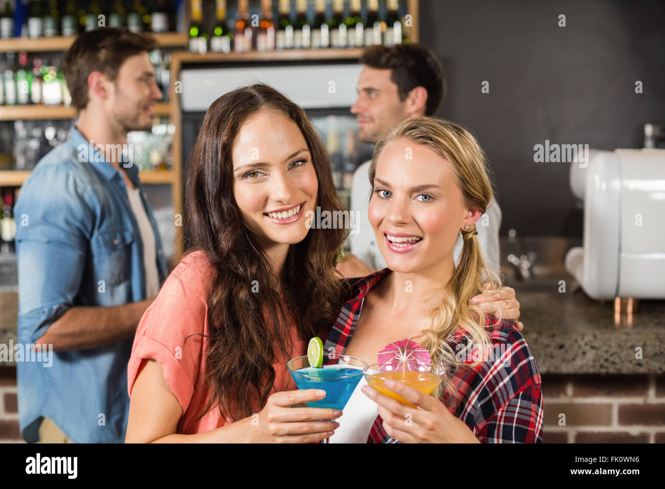 Women toasting in front Stock Photo - Alamy