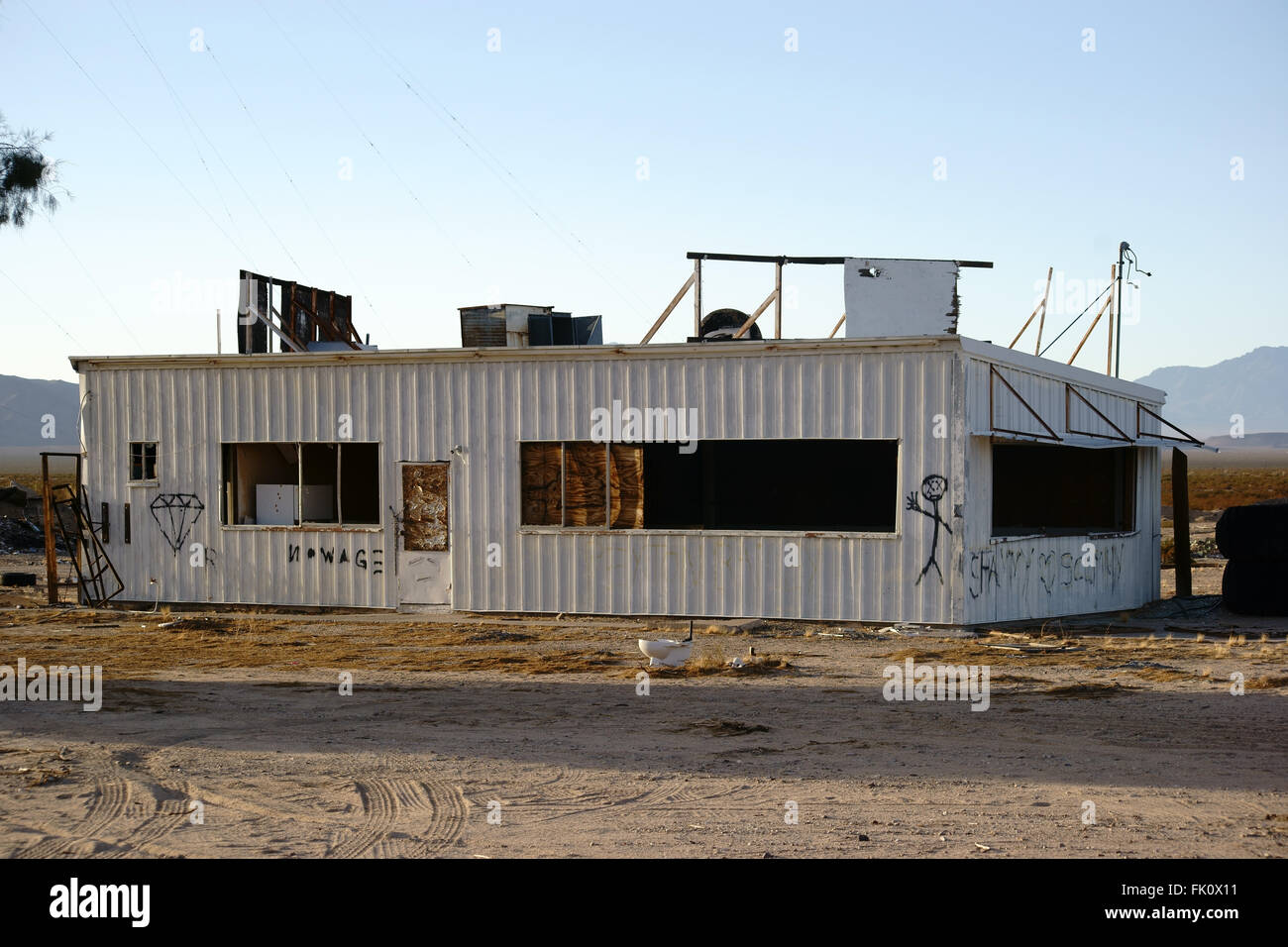 Sheet metal ruin in the wasteland Stock Photo - Alamy