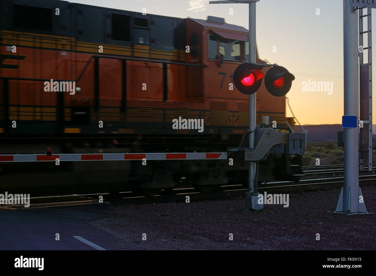Railroad crossing at night Stock Photo - Alamy