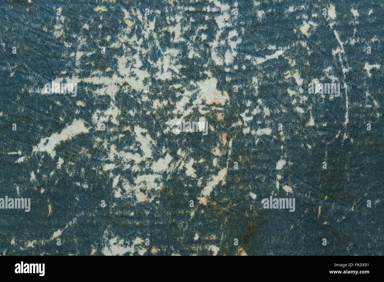 Badly damaged dark blue cardboard texture Stock Photo - Alamy