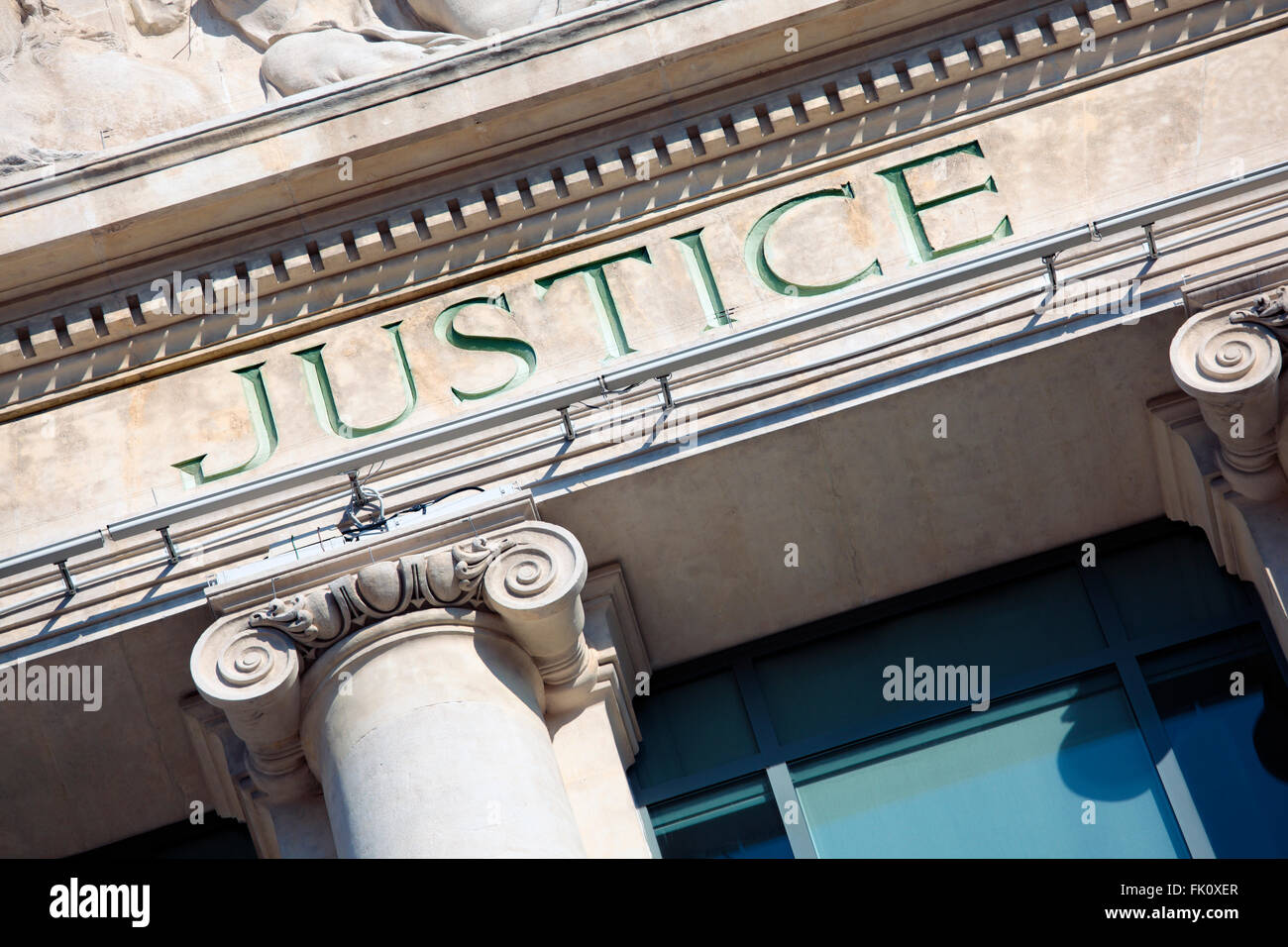 Justice sign on a Courthouse Building Stock Photo - Alamy