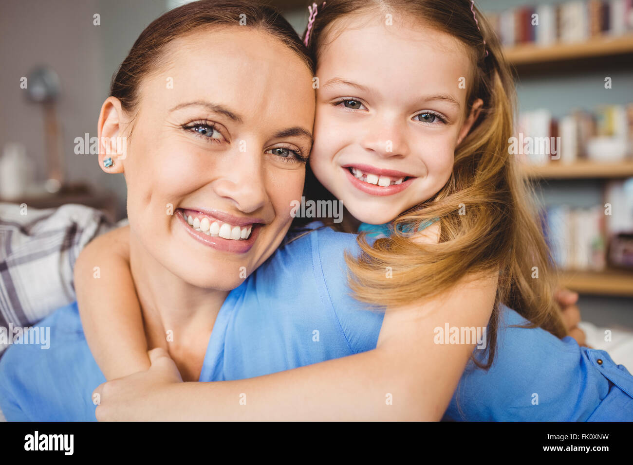 Portrait of cheerful mother and daughter Stock Photo - Alamy