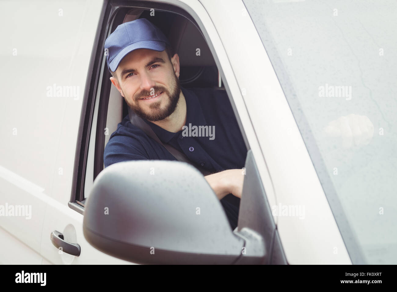 Male courier sitting in hi-res stock photography and images - Alamy