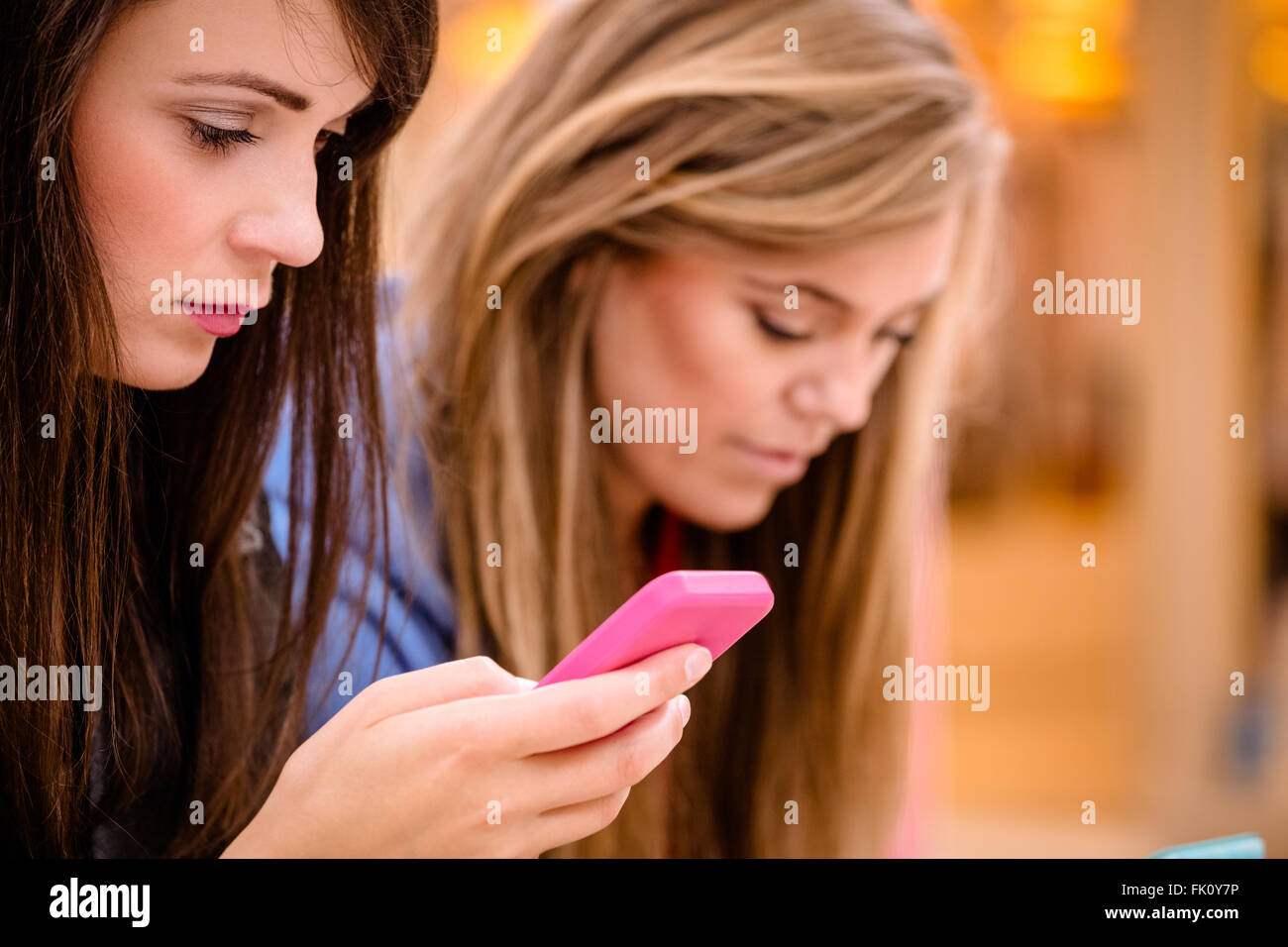 Beautiful women using cell hi-res stock photography and images - Alamy