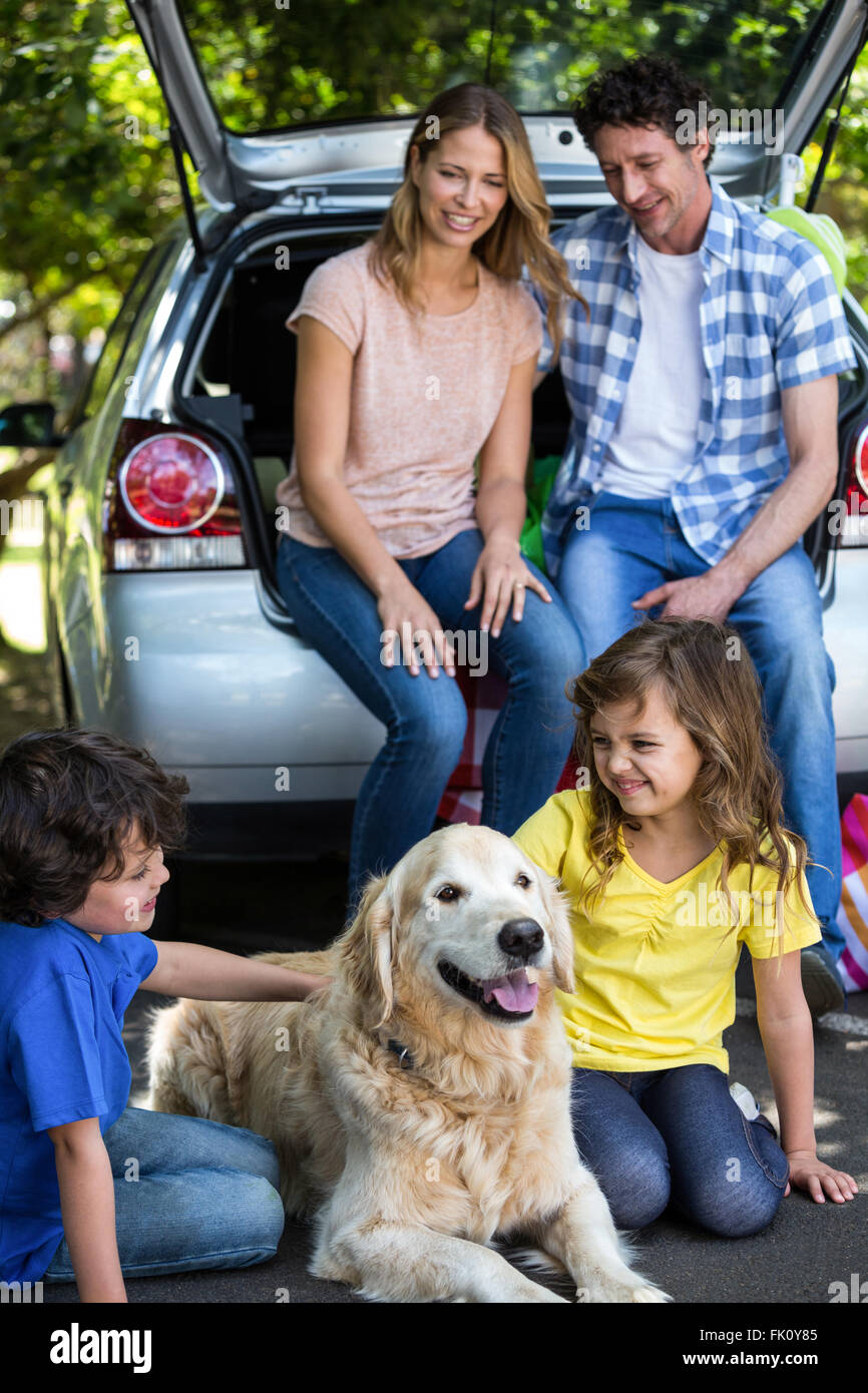Children ruffling the dogs fur Stock Photo - Alamy