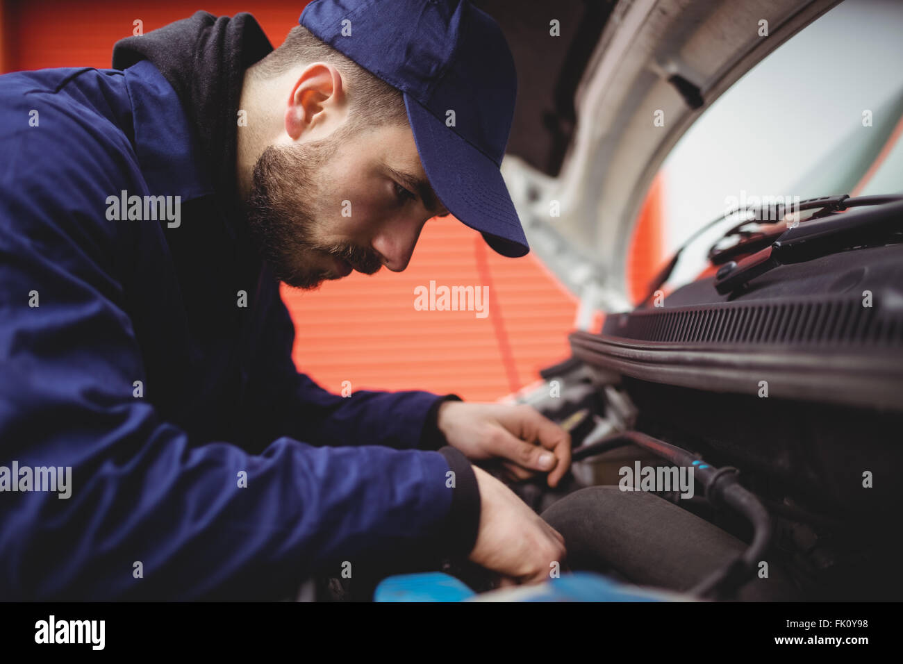 Mechanic fixing a van Stock Photo - Alamy