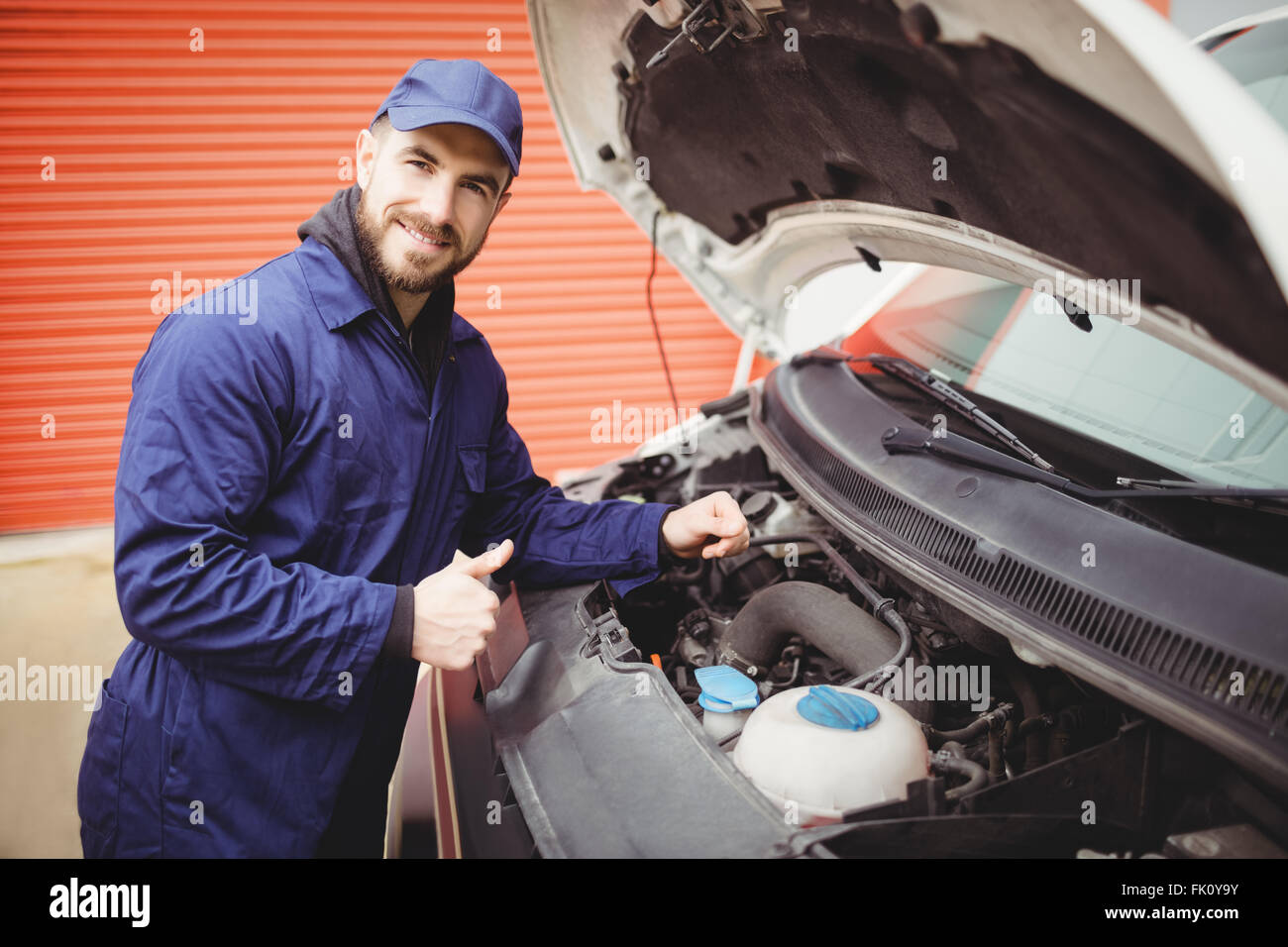 Mechanic fixing a van Stock Photo - Alamy
