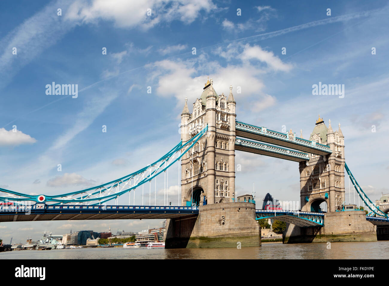 Wide angle view of Tower Bridge London with red double decker bus in ...