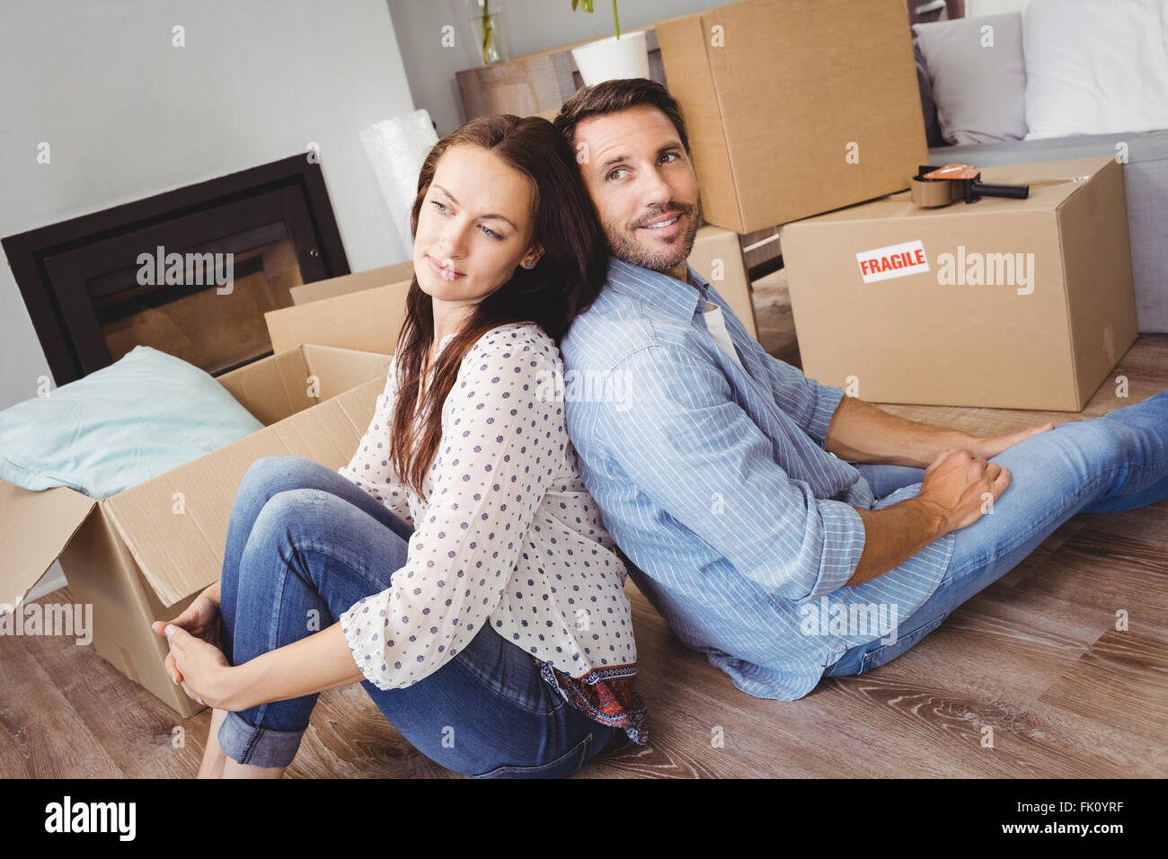 Family couple unpacking boxes hi-res stock photography and images - Alamy