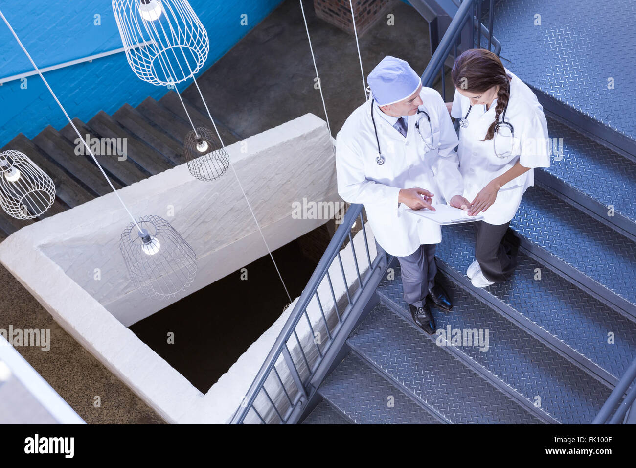 Doctors checking medical report hi-res stock photography and images - Alamy
