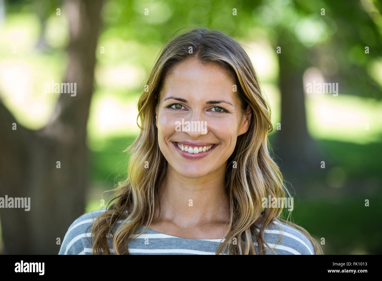 Portrait of a smiling woman Stock Photo - Alamy