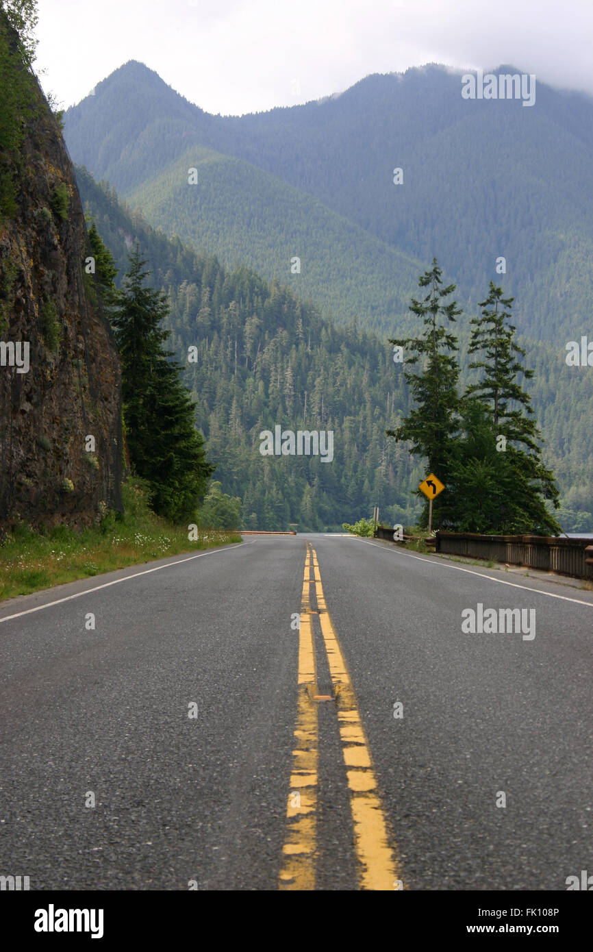 Low angle view from the center of an empty road Stock Photo - Alamy