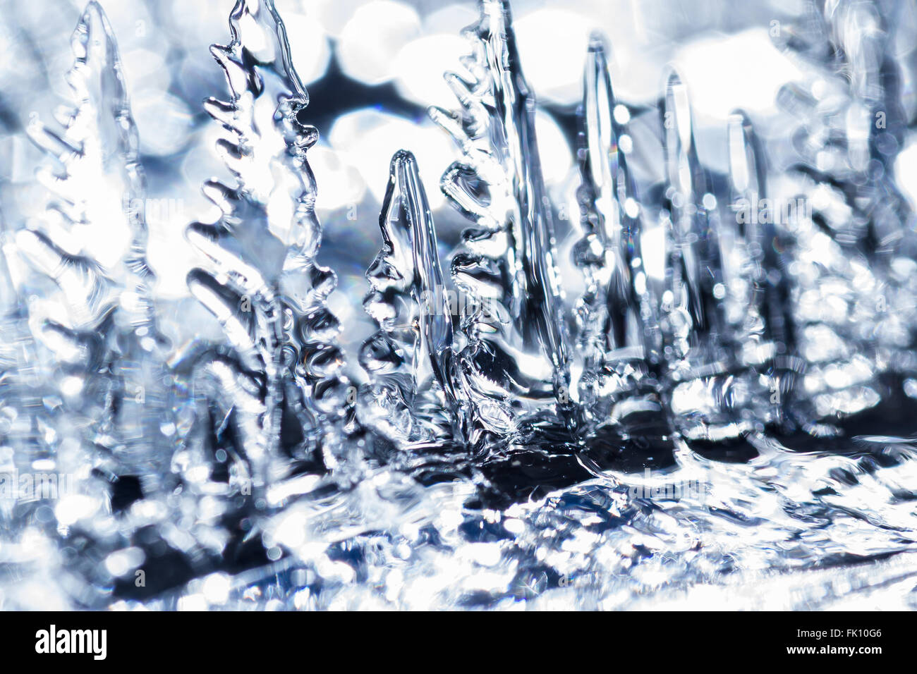 close up of sharp cool looking ice shards in beautiful figures on a ...