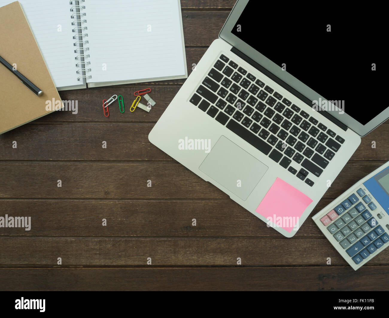 notebook, laptop,Calculator on desk. working concept Stock Photo - Alamy